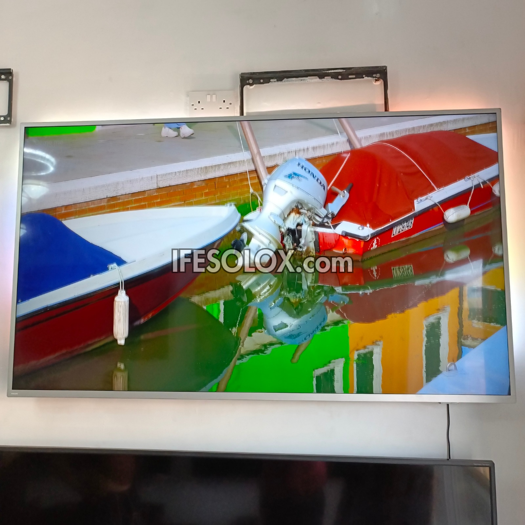 Philips 65 Inch 65PUS7304/12 Smart 4K UHD Android TV with 3-sided Ambi ...